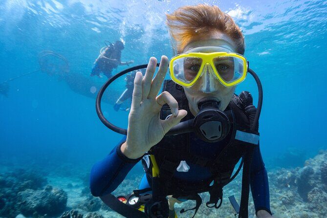 Baptism diving in the turquoise waters of Tahiti - The Practical Details
