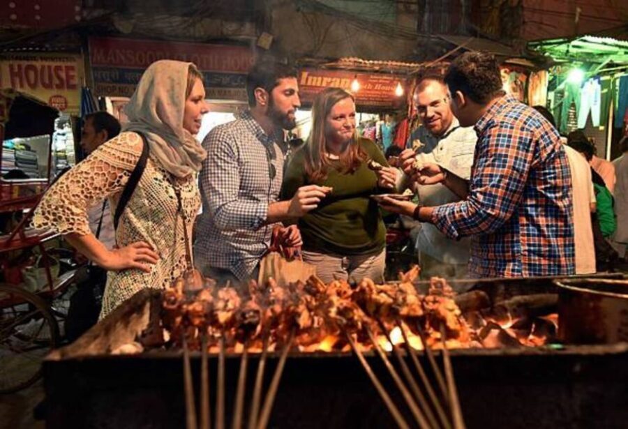 Delhi: Street Food Walking Tour of Old Delhi with Tastings - Transport and Group Dynamics