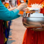 Early morning Doi Suthep with monk chanting and alms - The Monks’ Alms Procession: A Sacred Ritual