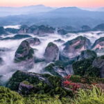 From Guilin: Danxia Peaks & Guangxi-Hunan Tribal Trails Tour - Exploring Dragon Head Peak: A Cliffside Marvel