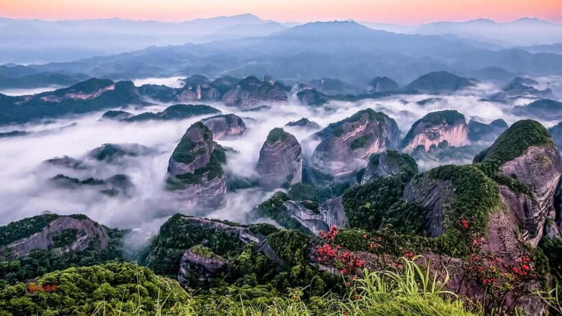 From Guilin: Danxia Peaks & Guangxi-Hunan Tribal Trails Tour - Exploring Dragon Head Peak: A Cliffside Marvel