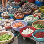 Ho Chi Minh City: City Highlights Tour by Cyclo - Discovering Binh Tay Market and Architectural Charm