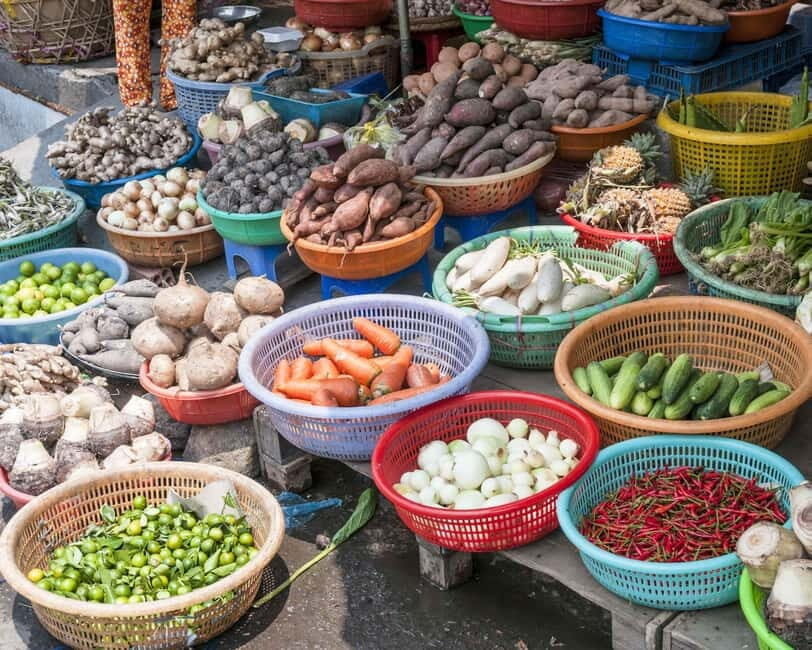 Ho Chi Minh City: City Highlights Tour by Cyclo - Discovering Binh Tay Market and Architectural Charm