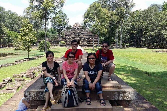 Sun Set in Angkor Wat, explore Bayon, Ta Prohm & Street Food - The smiling faces of the Bayon