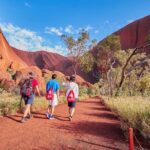 Uluru (Ayers Rock) Base and Sunset Half-Day Trip with Opt Outback BBQ Dinner - Walking to Mutitjulu Waterhole on the Kuniya Walk