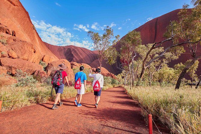 Uluru (Ayers Rock) Base and Sunset Half-Day Trip with Opt Outback BBQ Dinner - Walking to Mutitjulu Waterhole on the Kuniya Walk
