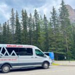Calgary Downtown to Banff via Canmore Shared Shuttle - Detailed Breakdown of Stops and Journey