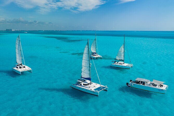 Cancún Catamaran to Isla Mujeres + Snorkel, Open Bar & Lunch - The Catamaran Experience: Cruising in Comfort and Style