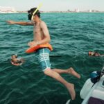 Cancun: Isla Mujeres Adults Only Party Catamaran with Drinks - Practical Details and Tips