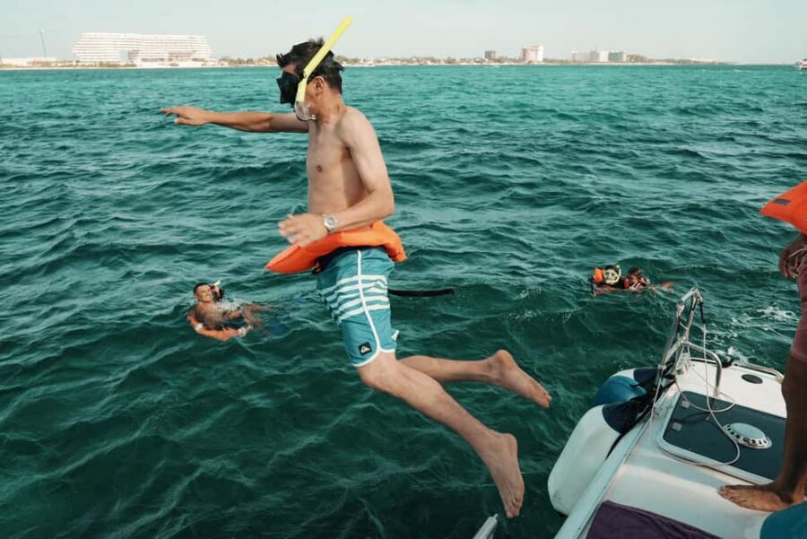 Cancun: Isla Mujeres Adults Only Party Catamaran with Drinks - Practical Details and Tips