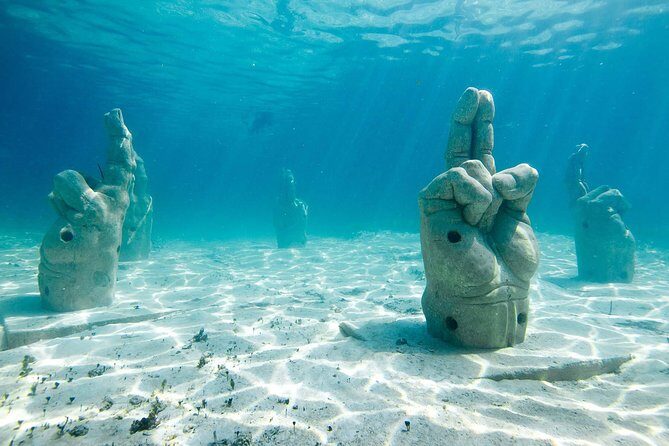 Catamaran Group Sightseeing, Snorkeling Tour Isla Mujeres - The Bottom Line