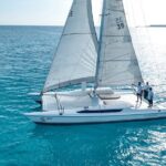 Catamaran Plus Reef Snorkeling and Isla Mujeres Visit - Navigating the Day on the Water and on Land