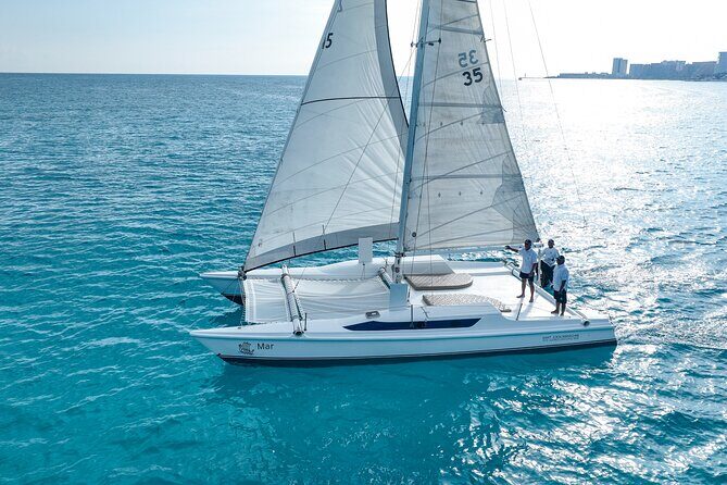 Catamaran Plus Reef Snorkeling and Isla Mujeres Visit - Navigating the Day on the Water and on Land