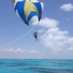Catamaran tour to Isla Mujeres with snorkeling, open bar - Relaxing at Isla Mujeres’ Beach Club