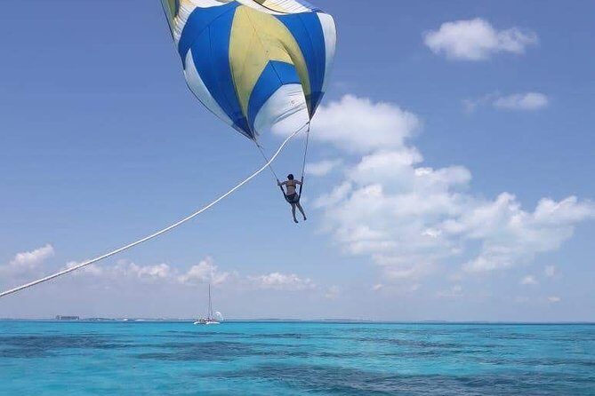 Catamaran tour to Isla Mujeres with snorkeling, open bar - Relaxing at Isla Mujeres’ Beach Club