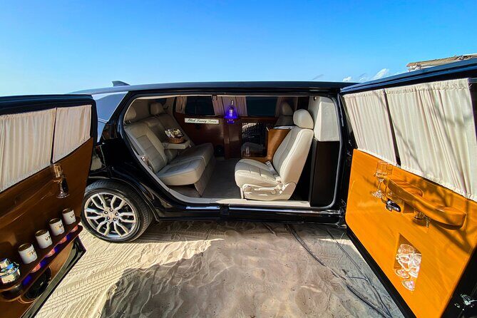 Deluxe GMC Limousine from CUN Airport to Playa Mujeres - The Ride: Comfort Meets Entertainment