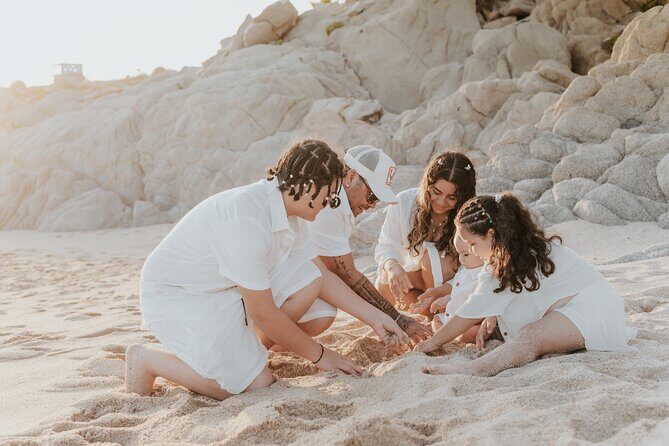 Family photo shoot on beach monuments - The Experience Provider: Waves and Frames