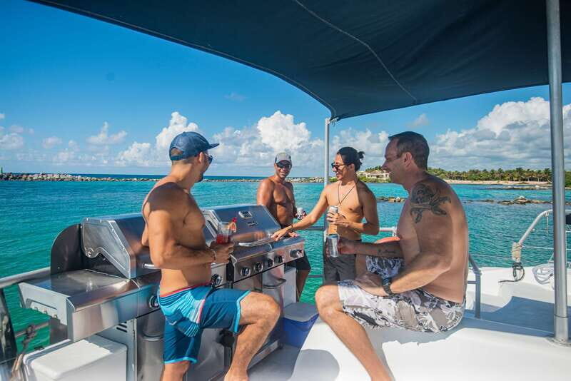 From Puerto Aventuras: Share Catamaran Tour - The Group Experience: Balancing Size and Atmosphere