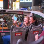 NYC: Sightseeing Night Tour by Open-Top Bus with Live Guide - The Guide and Atmosphere