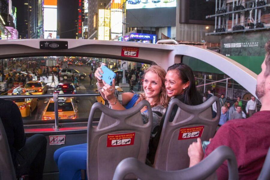 NYC: Sightseeing Night Tour by Open-Top Bus with Live Guide - The Guide and Atmosphere