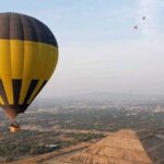 Private Balloon Flight Over Teotihuacan with Optional Transfer - Touchdown and Celebration