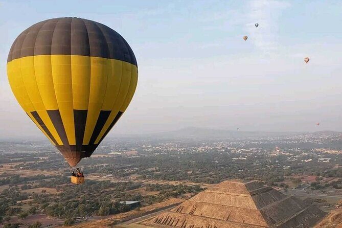 Private Balloon Flight Over Teotihuacan with Optional Transfer - Touchdown and Celebration