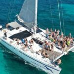 Sail Away Catamaran Day Trip with Snorkeling to Isla Mujeres - Key Points
