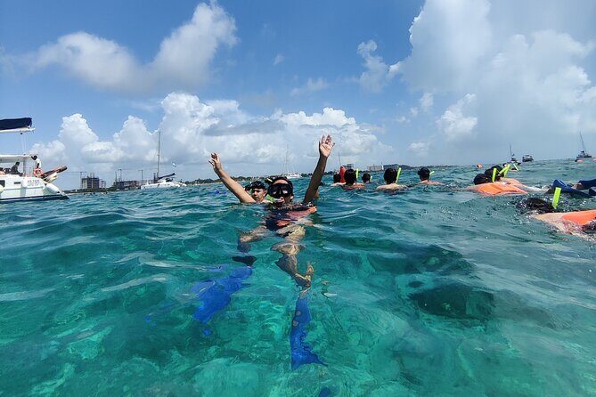 Top Isla Mujeres Catamaran Tour with Snorkel Open Bar and Buffet lunch - What the Reviews Tell Us