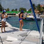 Wild adult catamaran party sailing to Isla Mujeres - Who Should Consider This Tour?