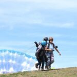 Bogota: Paragliding activity in La Calera with transfers - Landing and after-flight camaraderie