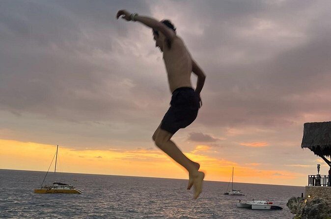 7 Mile Beach Party Catamaran Cruise with Snorkeling & Ricks Cafe - Authentic Perspectives from Travelers