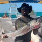 8HR Catch and Grill in Turks and Caicos Islands - A Day of Fishing, Snorkeling, and Beachside Feasting