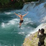 Bamboo Rafting and Blue Hole Waterfalls Tour - The Blue Hole: A Natural Wonderland