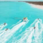 Jet Skiing around La famille ship and smaller pristine cays - The Guides: Knowledgeable, Friendly, and Attentive