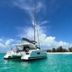 Noah's Ark Beach Club Tour on a Private Catamaran - The Catamaran Journey: What to Expect