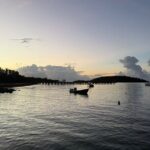 Transparent Canoes Illuminated on the Seawall of Hope - What to Expect at the Malecón de La Esperanza