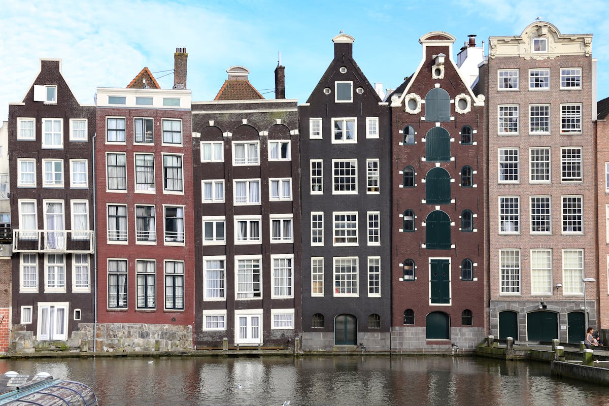 Historic canal houses along Amsterdam waterway