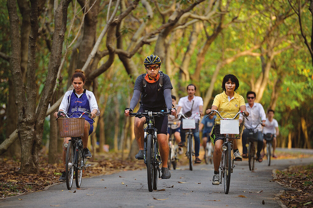Green cycling path through Bang Kachao jungle area in Bangkok