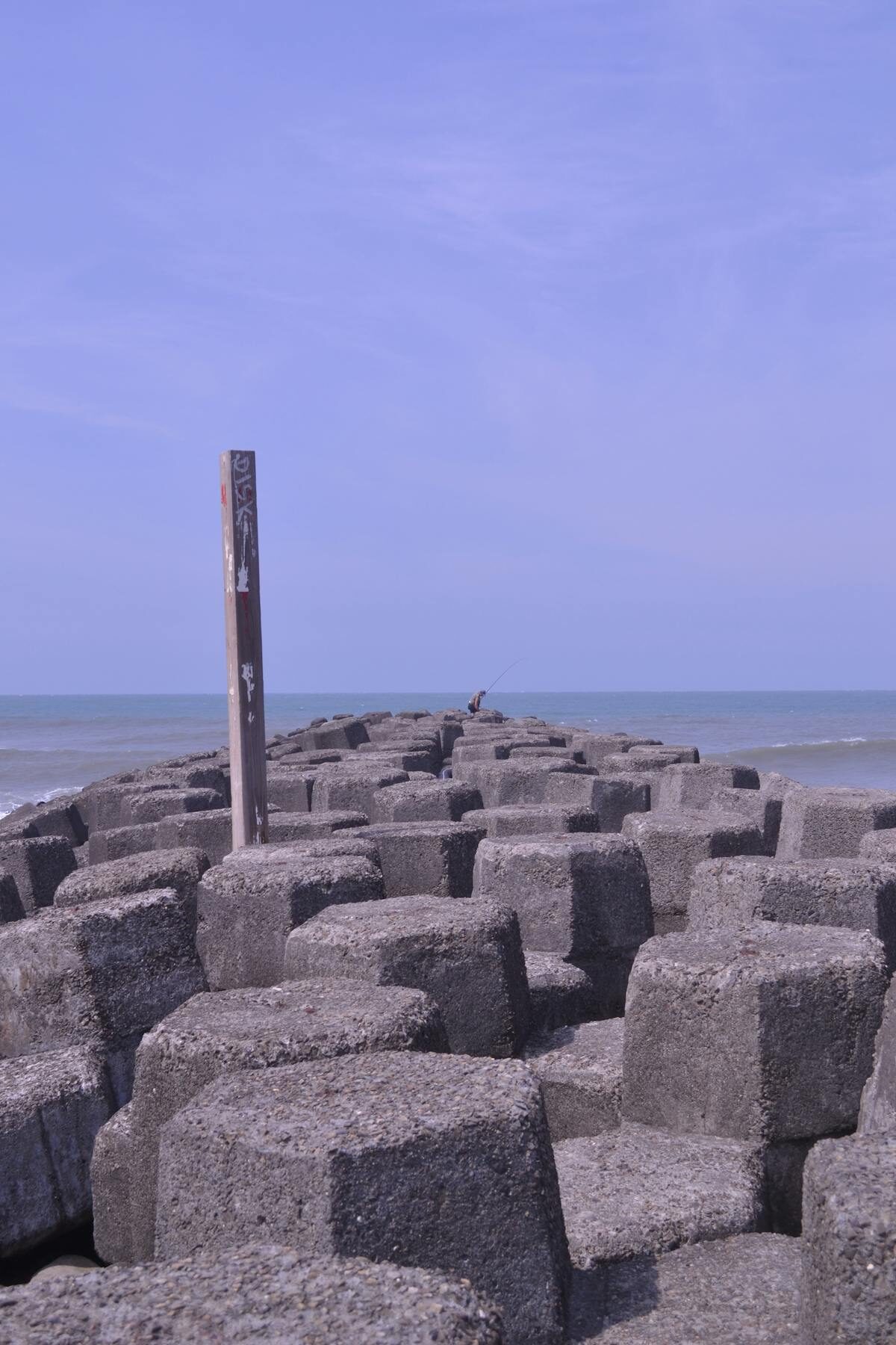 White windmills lined up on a ridge in Consuegra La Mancha