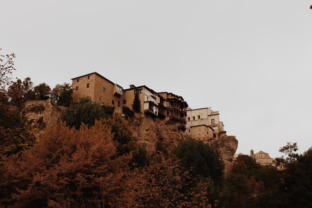 The famous hanging houses of Cuenca perched on the edge of a limestone cliff