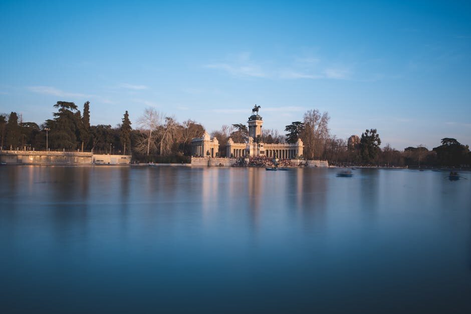 Retiro Park lake and monument at twilight in Madrid