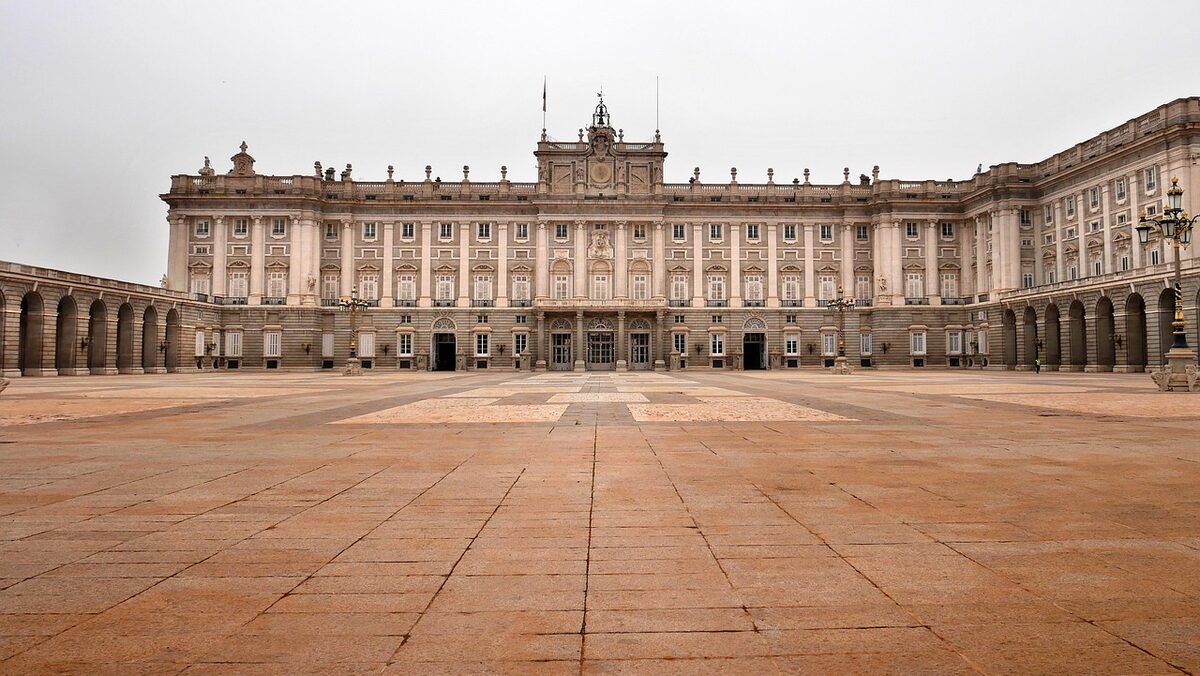 The Royal Palace of Madrid with its grand facade and formal gardens