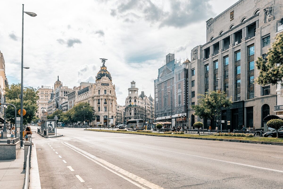 Madrid city street with buildings and sky