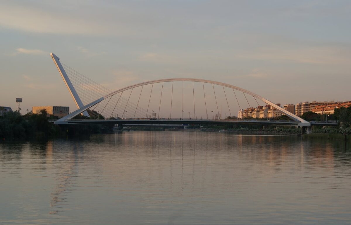 Evening view of a bridge over the river in Seville Spain