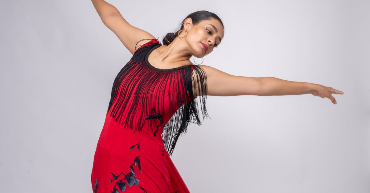 Flamenco dancer performing in a red dress