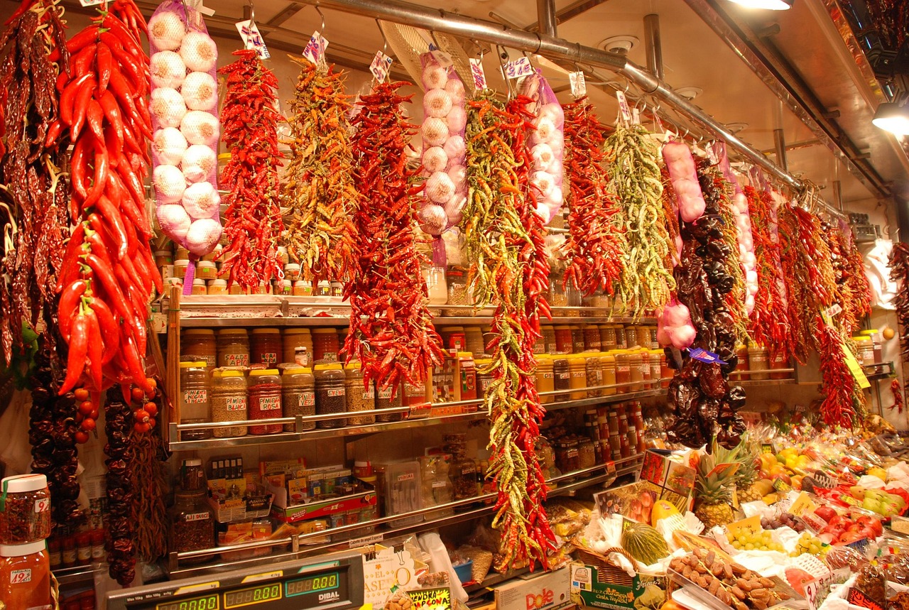 Colorful produce and peppers at La Boqueria food market Barcelona