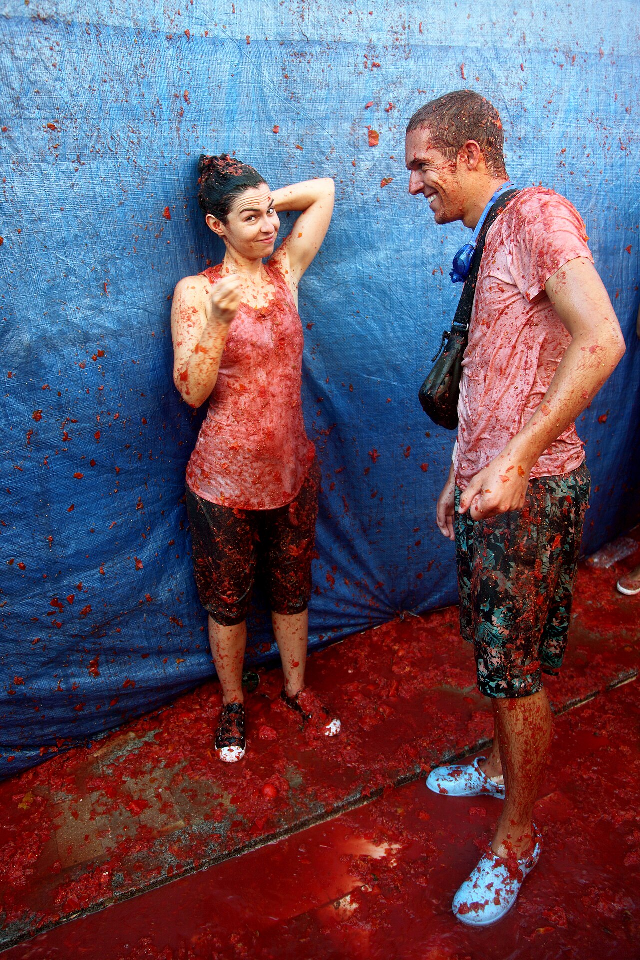Crowds covered in tomato juice during La Tomatina festival in Bunol Spain