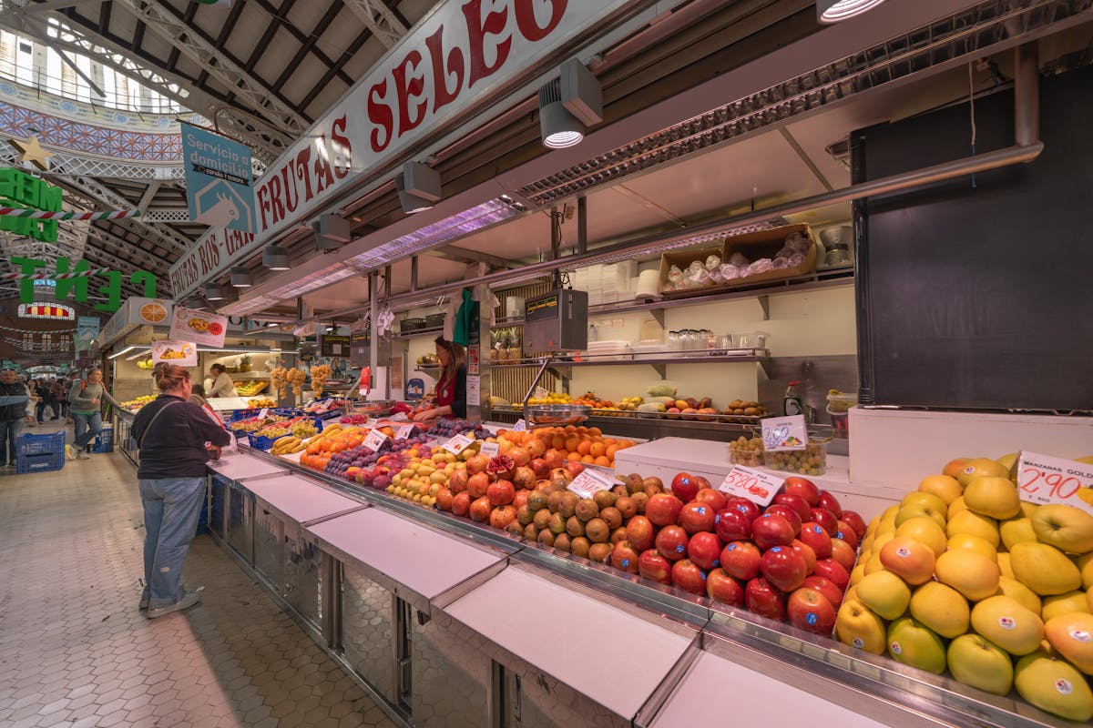 Colorful fruit stalls inside Mercado Central in Valencia Spain