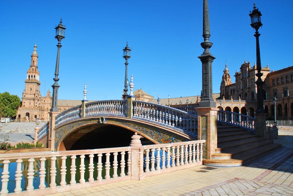 Ornate bridge with ceramic tilework at Plaza de Espana in Seville Spain