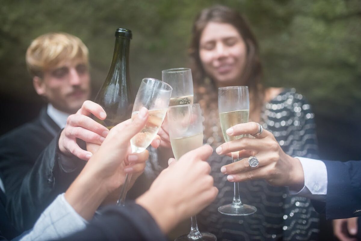 Joyful toast with sparkling wine glasses during an elegant celebration